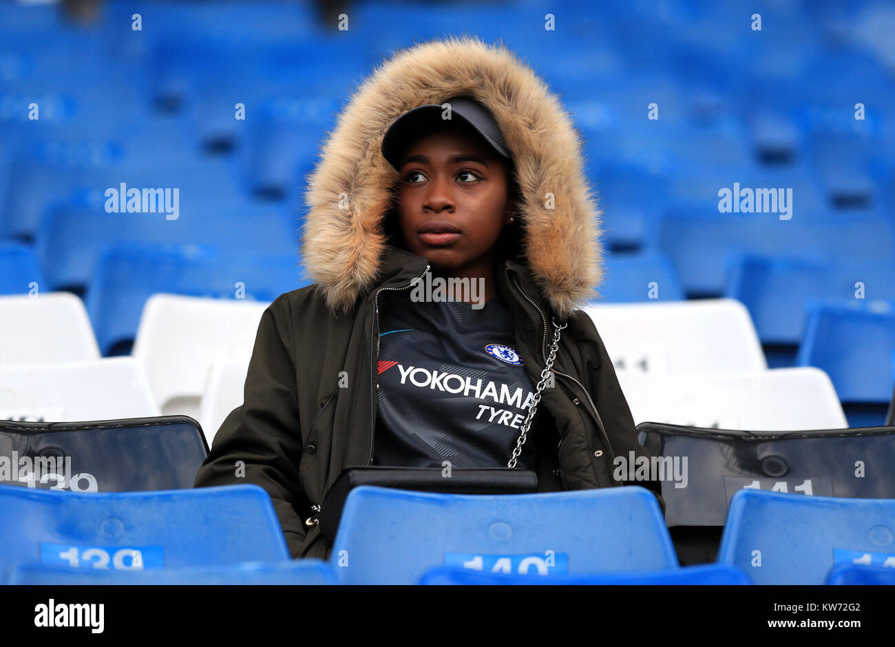 A Chelsea fan in the stands Stock Photo - Alamy