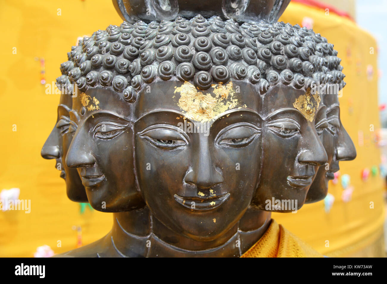 Many faces of bronze Buddha on the Golden mount in Bangkok, Thailand ...