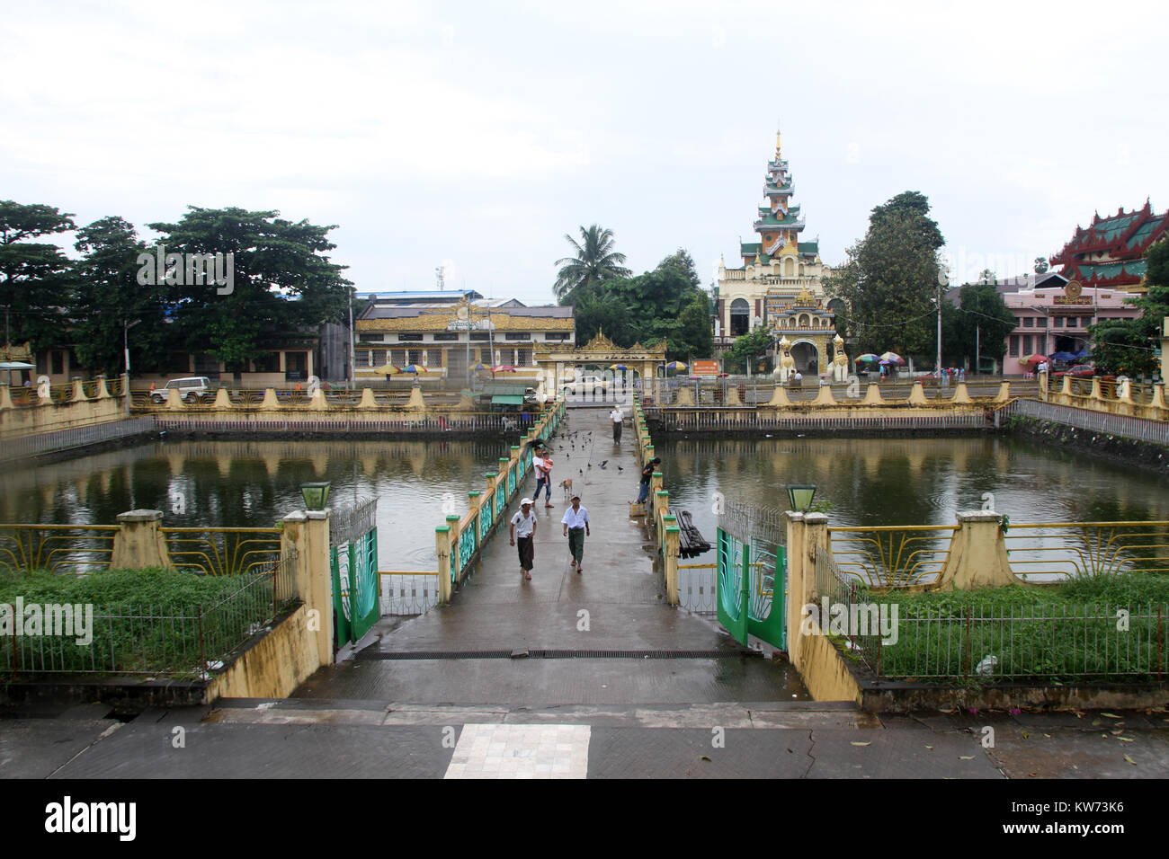 Sacral pond near buddhist temple in Yangon, Myanmar Stock Photo - Alamy