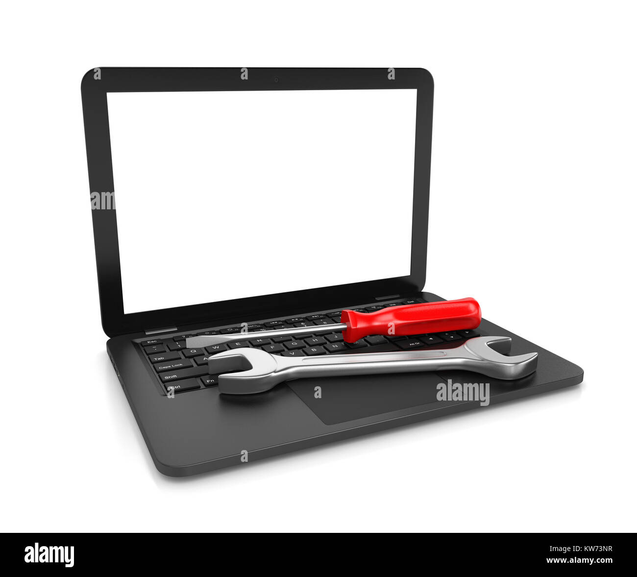 Laptop Computer with a Screwdriver and a Spanner on the Keyboard and ...