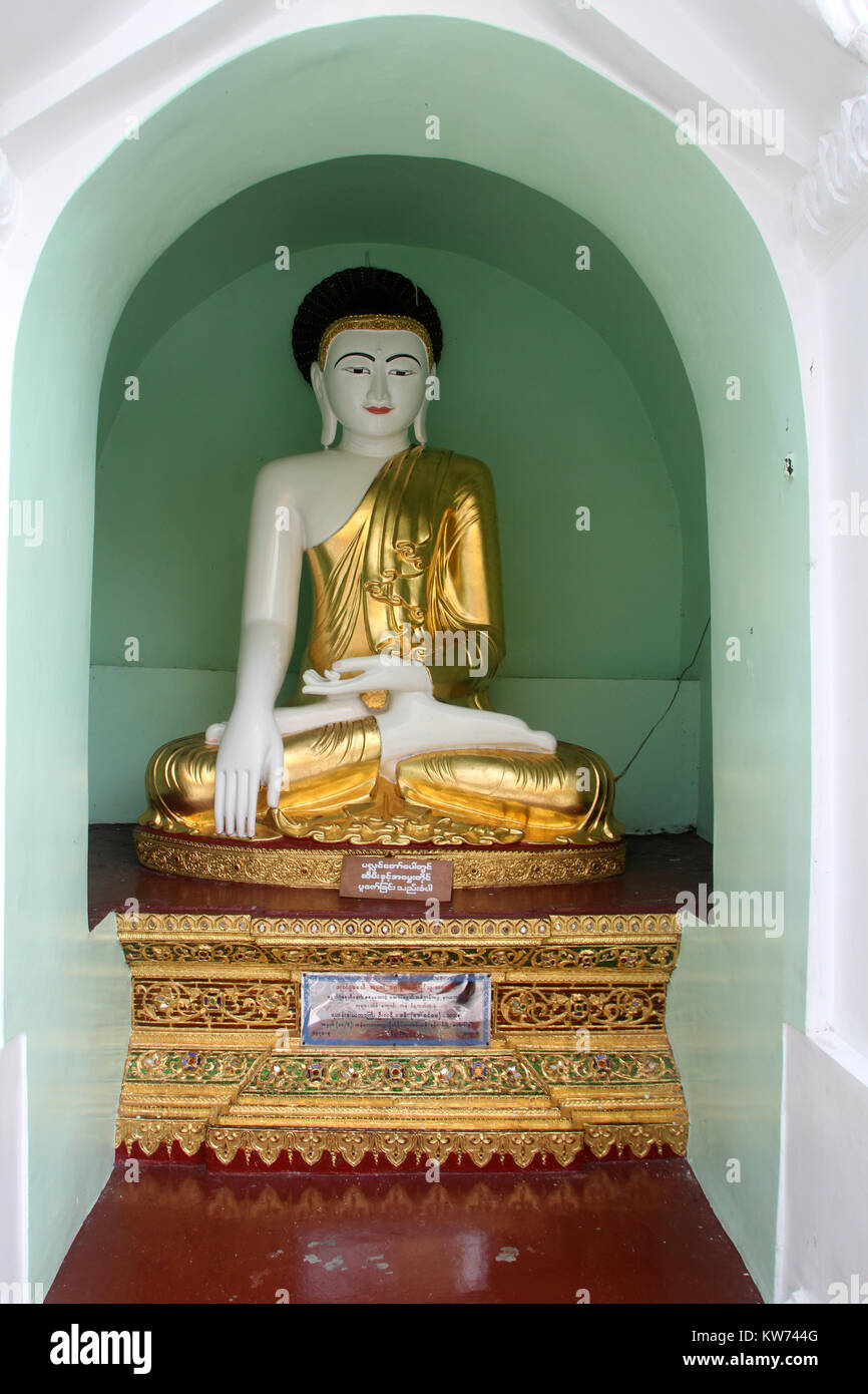 Buddha in the wall of Shwe Dagon pagoda, Yangon, Myanmar Stock Photo ...