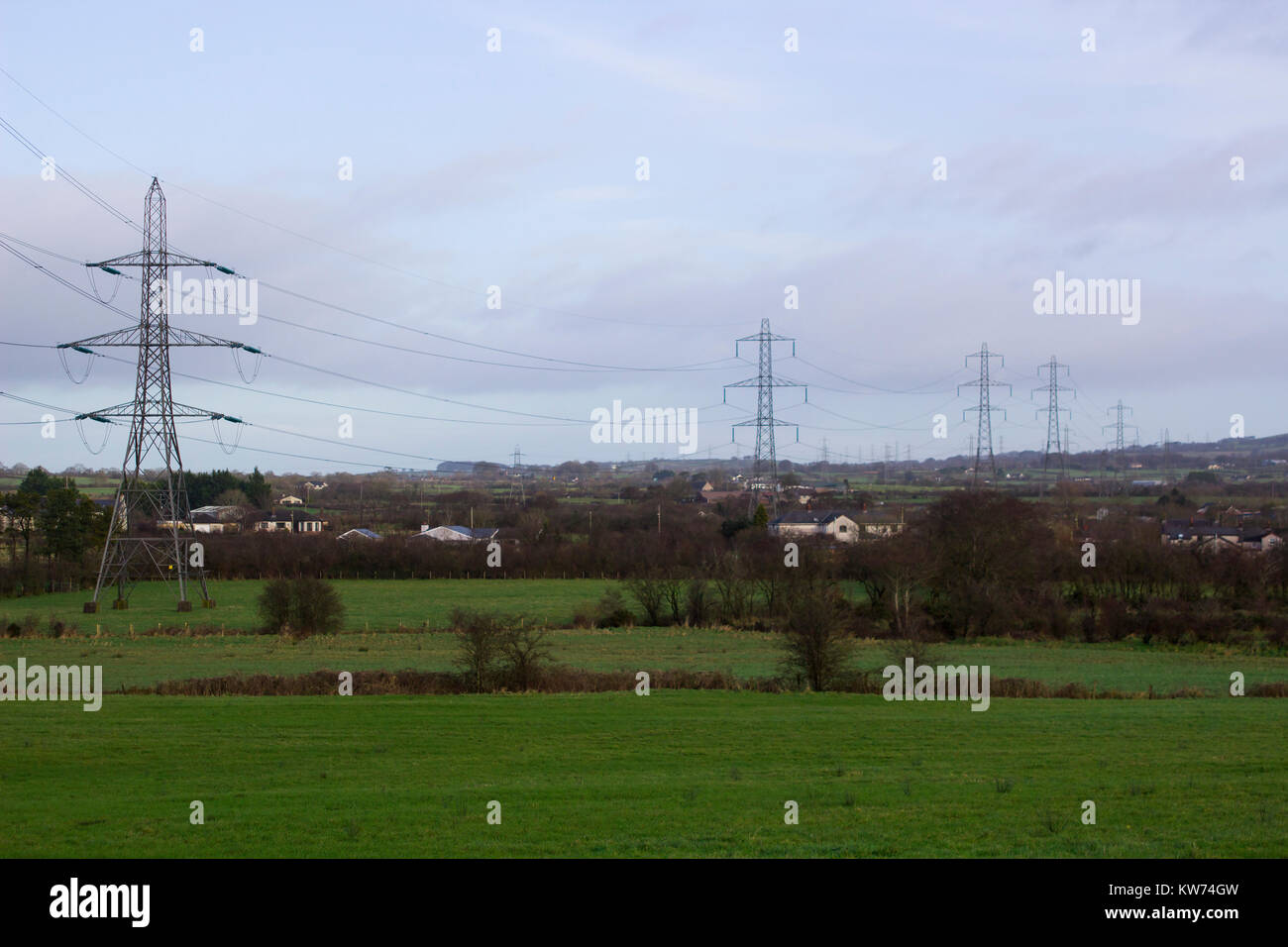 Large pylons and cables carrying electricity generated at Ballylumford ...