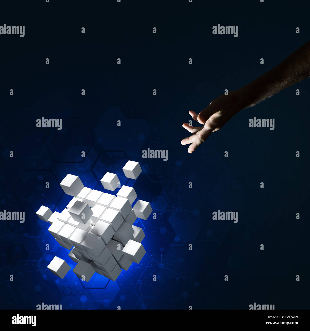 Close of man hand holding cube figure as symbol of innovation. Mixed ...