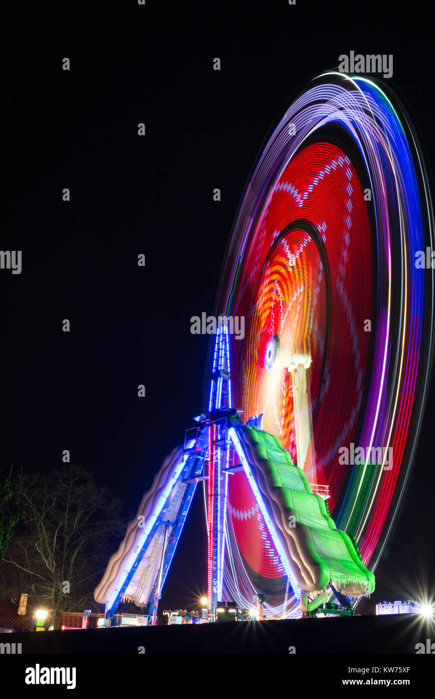 Trails of light from spinning rides at Winter Wonderland in Londons ...
