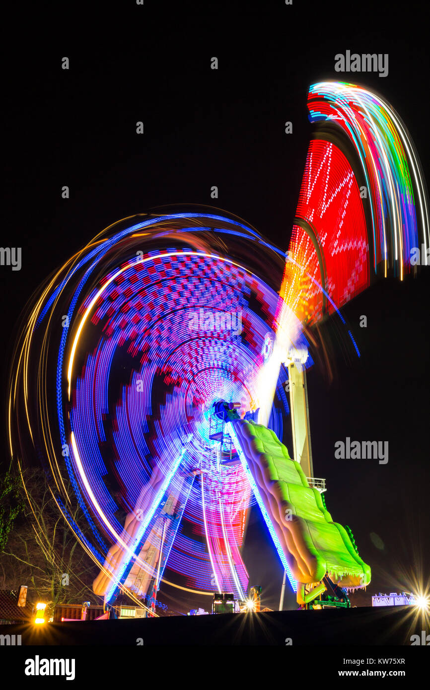 Trails of light from spinning rides at Winter Wonderland in Londons ...