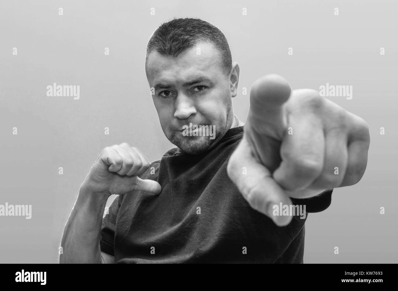 Sad man white background standing Black and White Stock Photos & Images ...