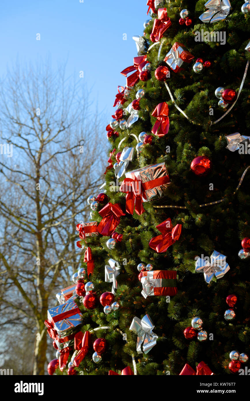 Christmas tree with present parcel gift decorations, bows and baubles ...