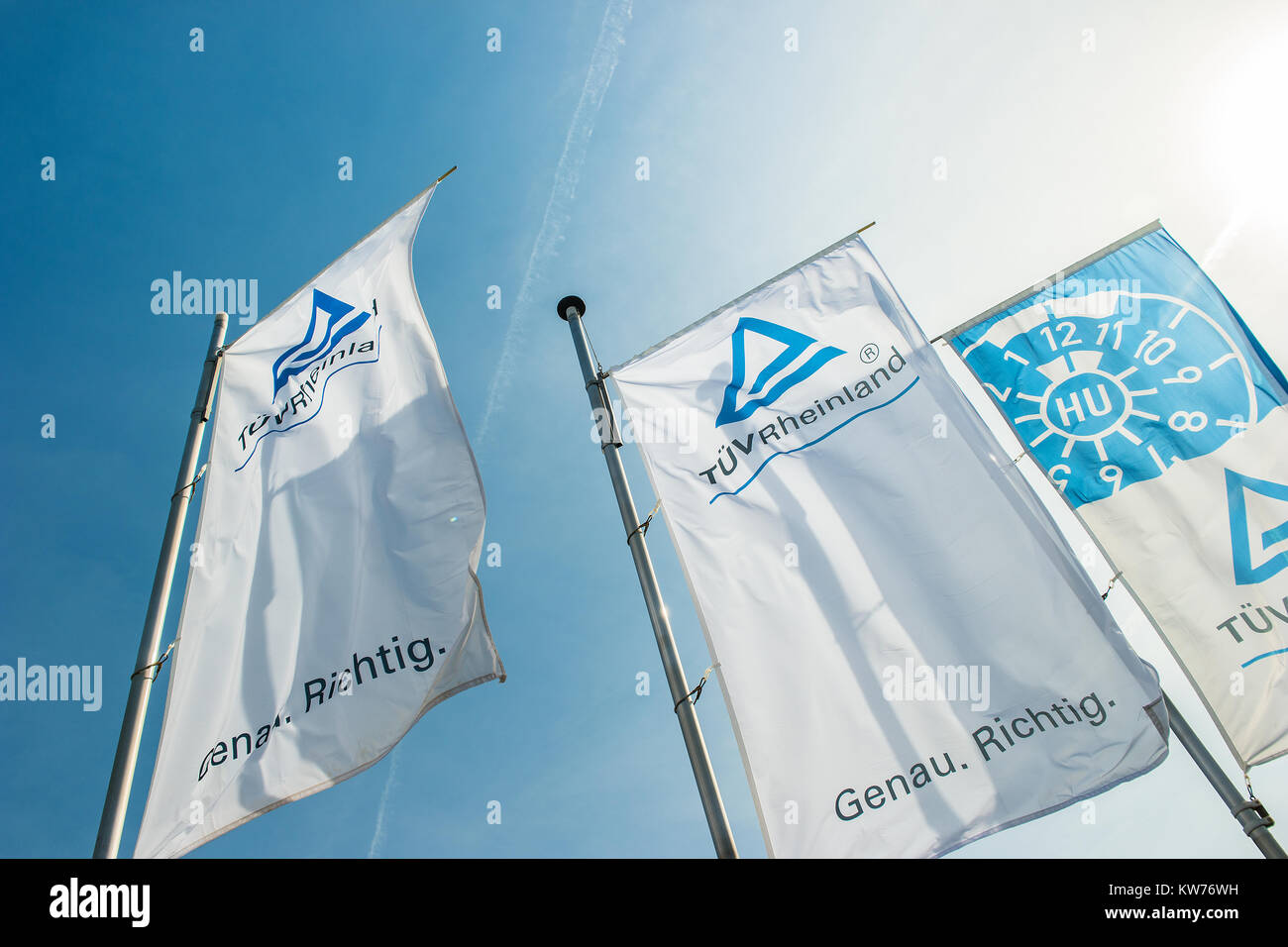 The Logo of the "TÜV Rheinland Deutschland" on a flags. The TÜV ...