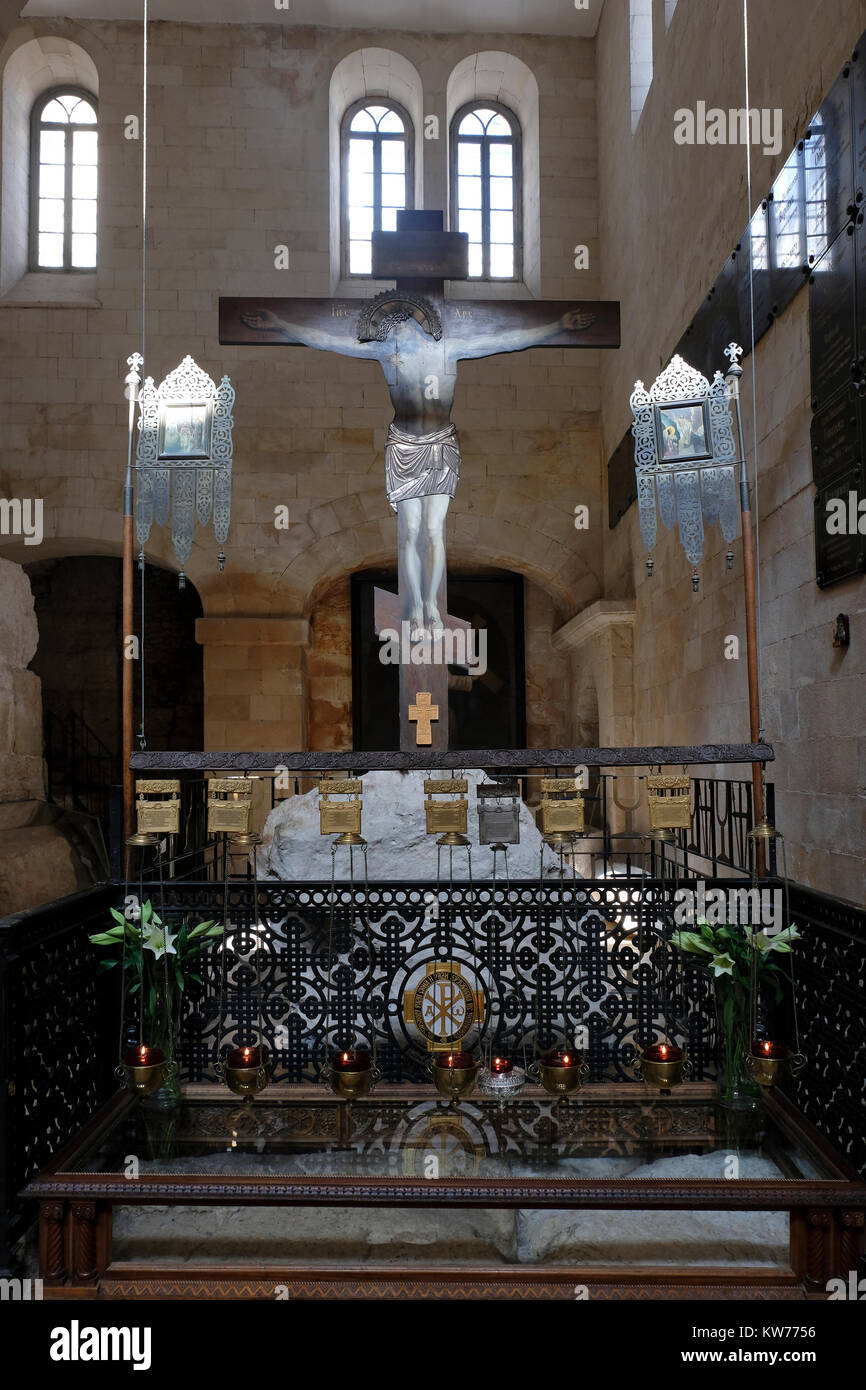A crucifix over large piece of the rock of Calvary, purchased when the ...