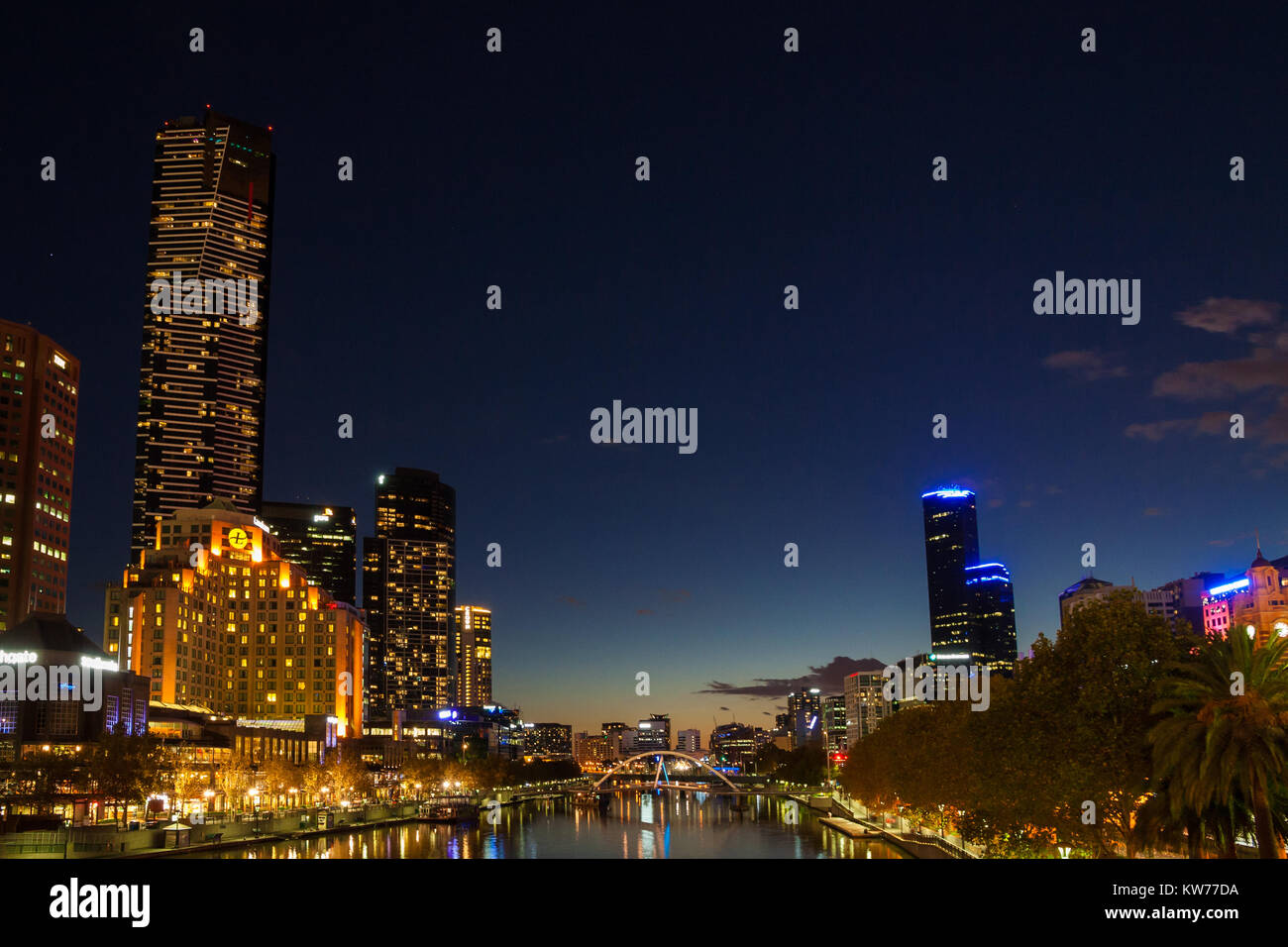 Southbank Promenade in Melbourne at night. The Yarra River is in east ...