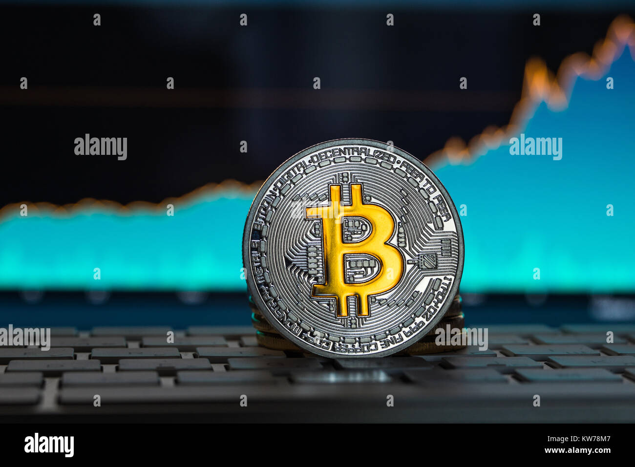 Gold Bitcoin on the background of the chart Stock Photo - Alamy