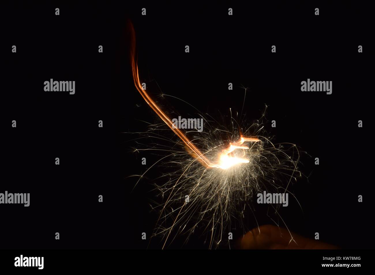 popular Hand firework with sparkler Stock Photo - Alamy
