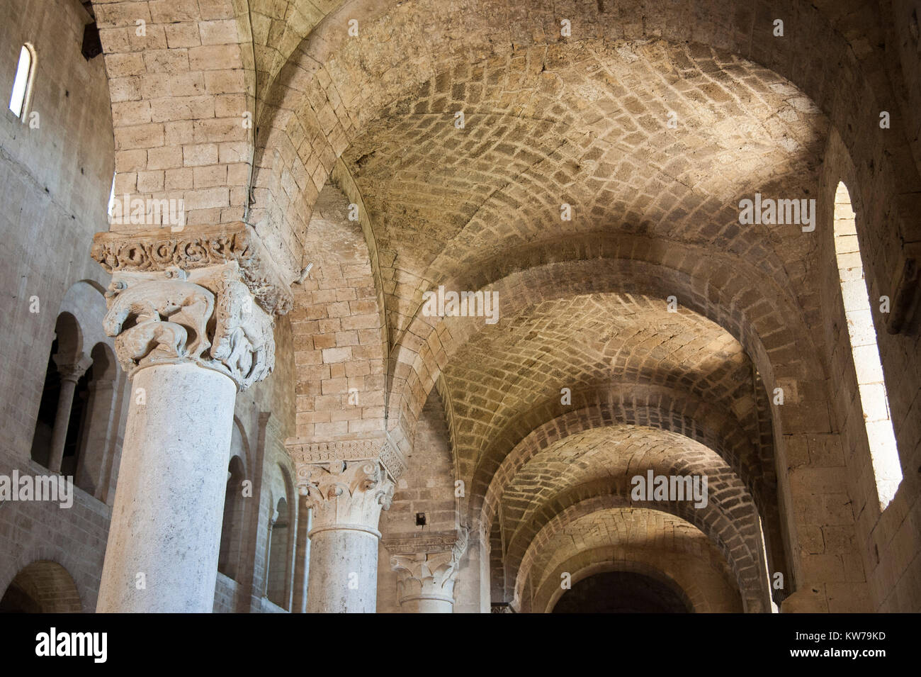Romanesque capital Daniele nella fossa dei leoni (Daniel in the lions ...