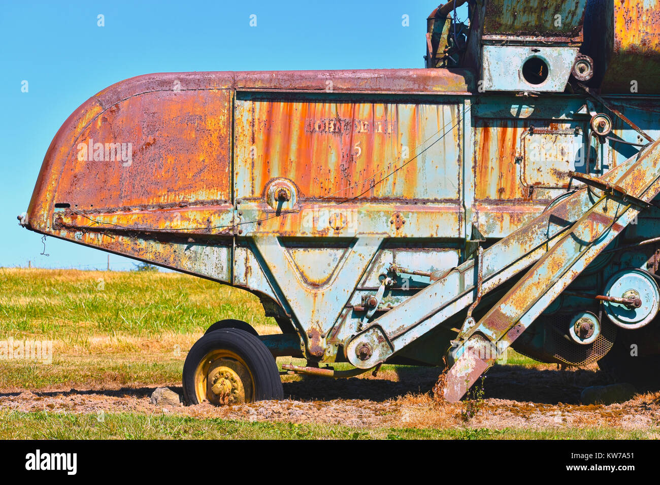 Old rustic John Deere farming equipment with a beautiul weathered ...
