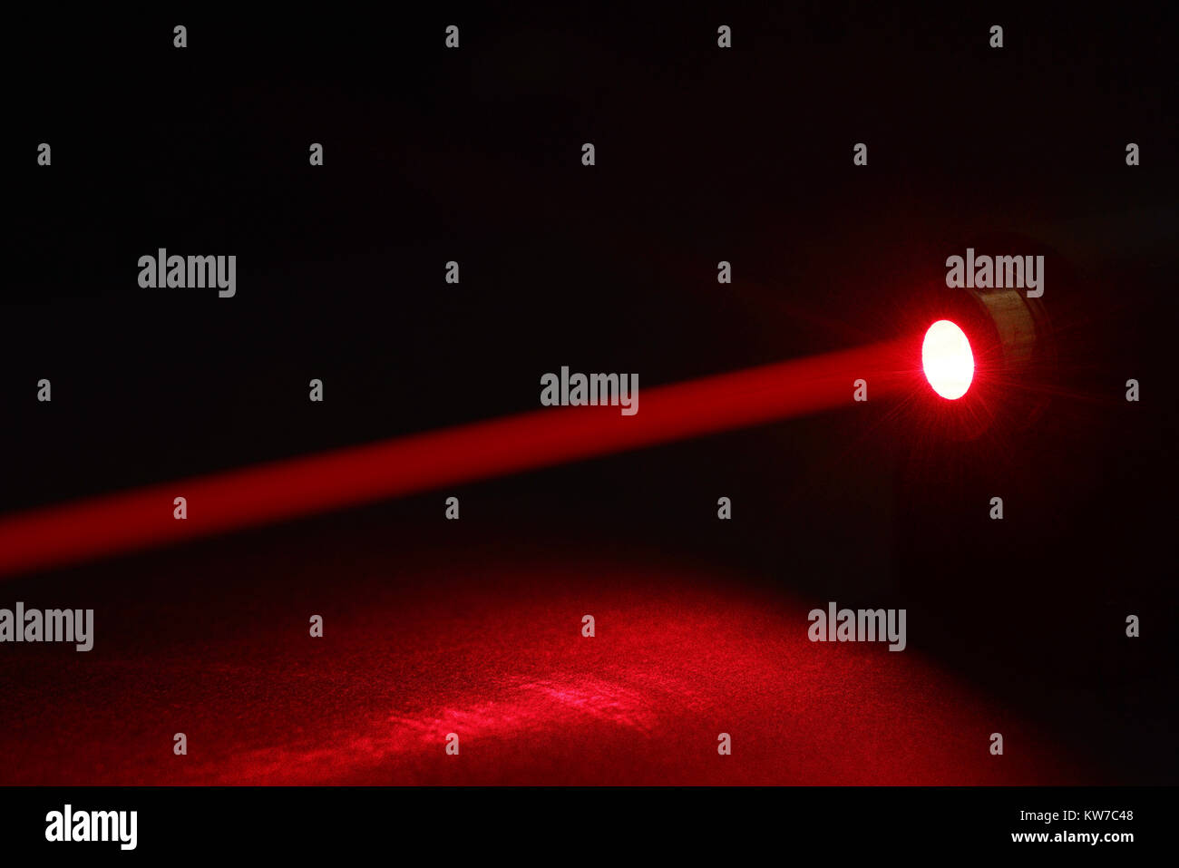 Photocell with laser beam for remote triggering of a camera Stock Photo ...