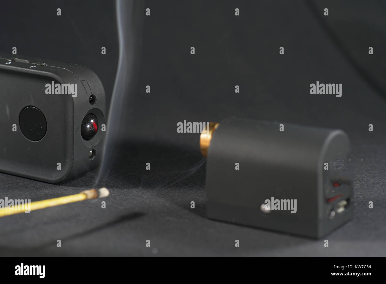 Photocell with laser beam for remote triggering of a camera Stock Photo ...