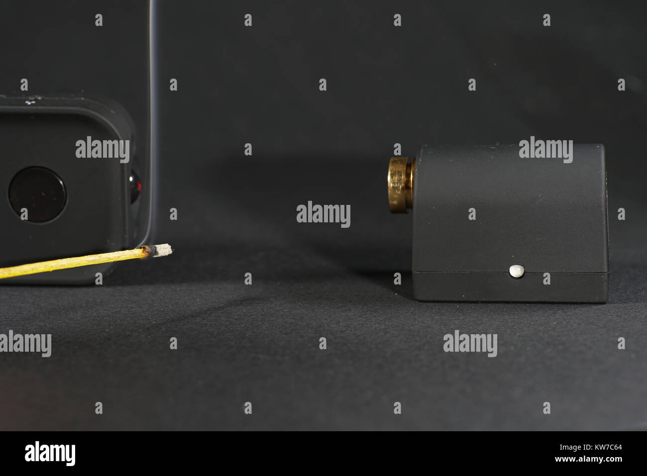 Photocell with laser beam for remote triggering of a camera Stock Photo ...