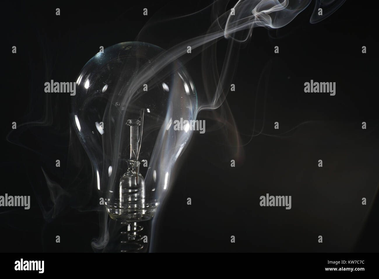Lightbulb with smoke showing aerodynamics also suitable as a background ...