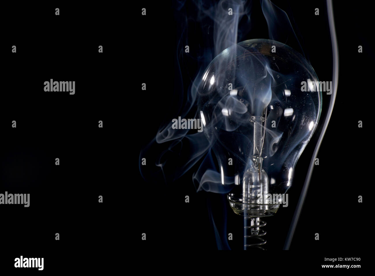 Lightbulb with smoke showing aerodynamics also suitable as a background ...