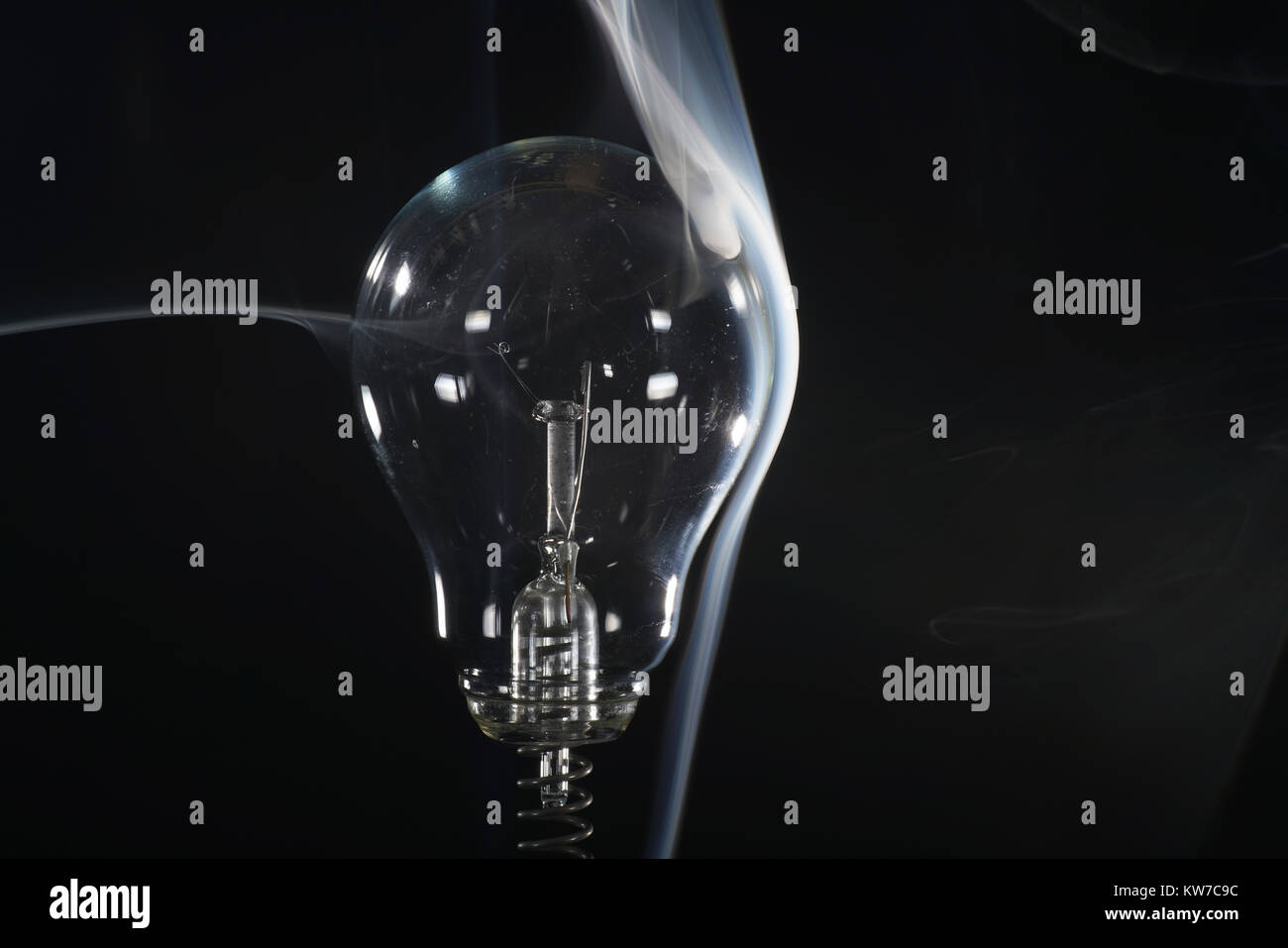 Lightbulb with smoke showing aerodynamics also suitable as a background ...