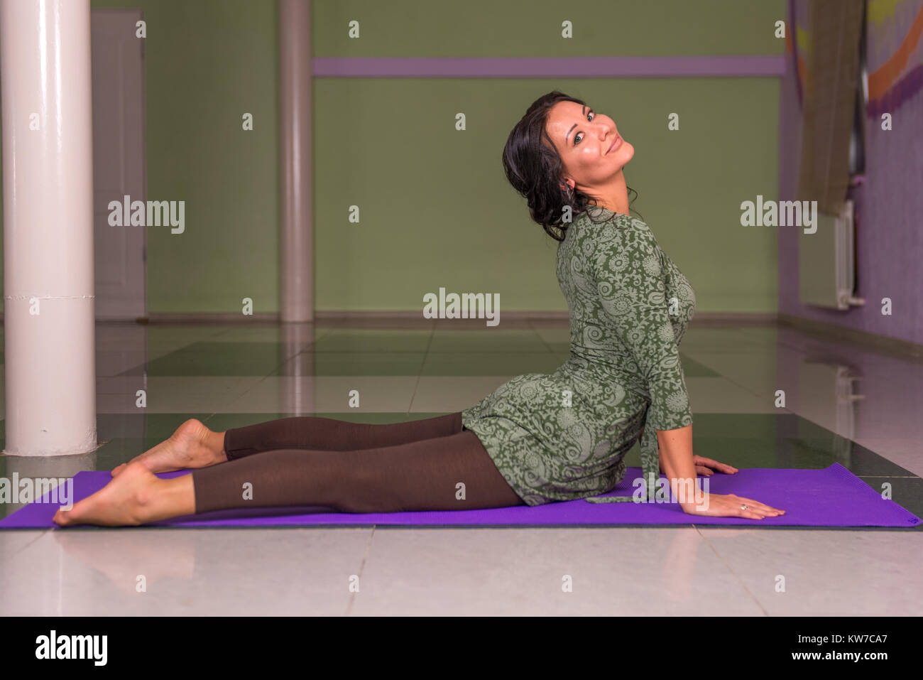 Woman performs yoga poses hi-res stock photography and images - Alamy