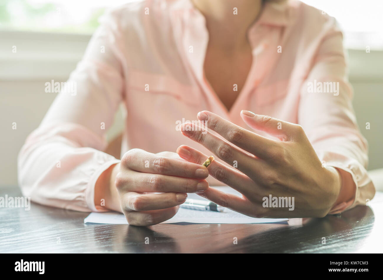 Pulling off wedding ring hi-res stock photography and images - Alamy