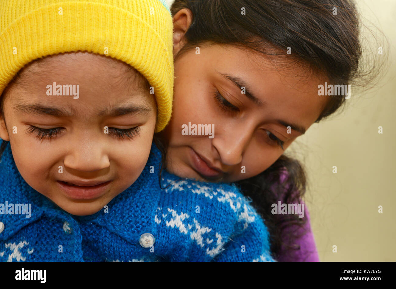 Cuddling with baby Stock Photo - Alamy