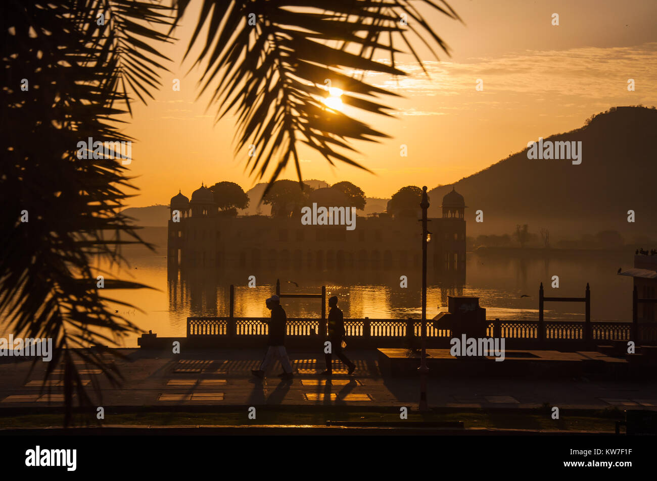 sunset over an old castle in India Stock Photo - Alamy