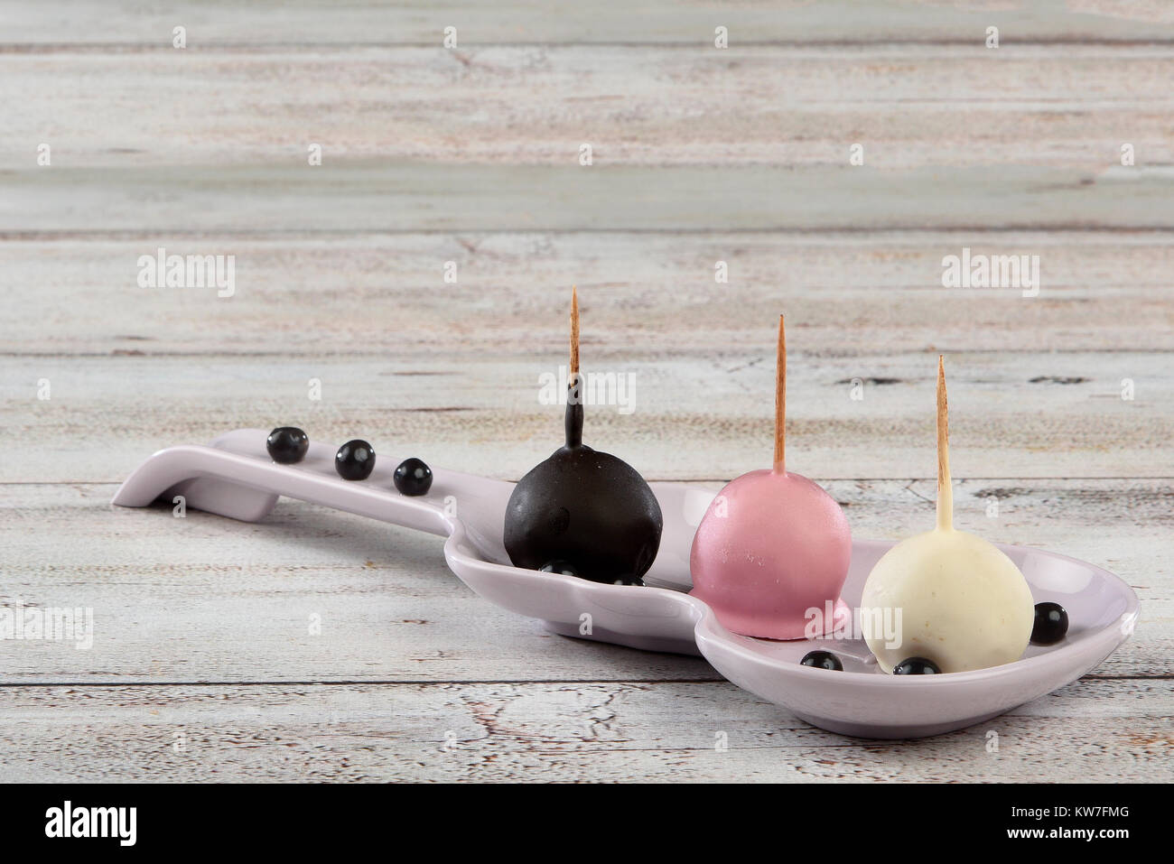 Three chocolate balls Stock Photo - Alamy