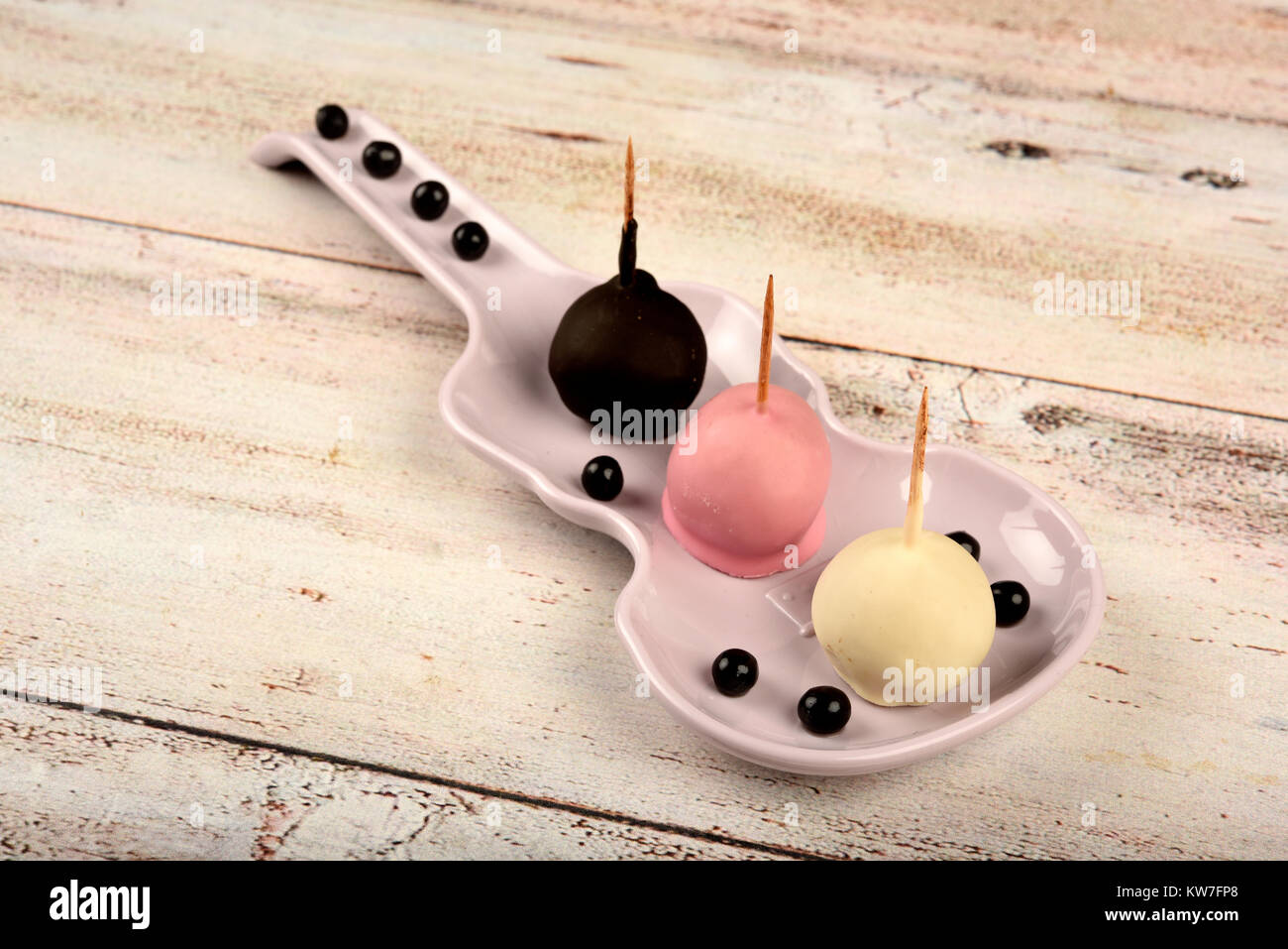 Three chocolate balls Stock Photo - Alamy