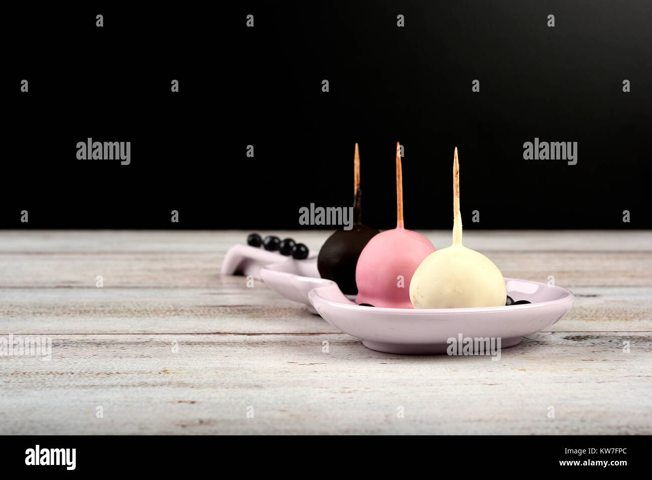 Three chocolate balls Stock Photo - Alamy