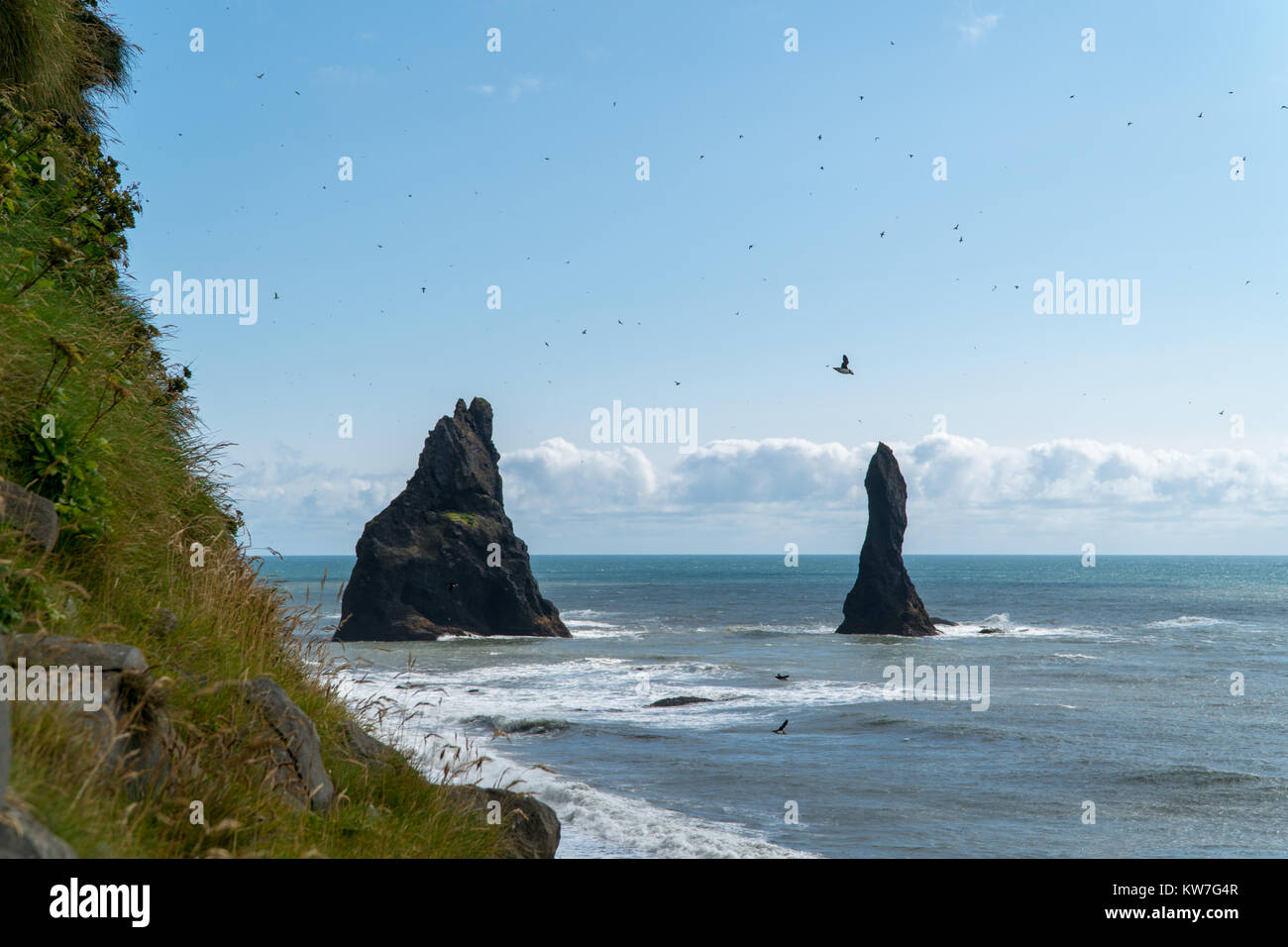 Famous Reynisdrangar rock formations at black Reynisfjara Beach. Coast ...