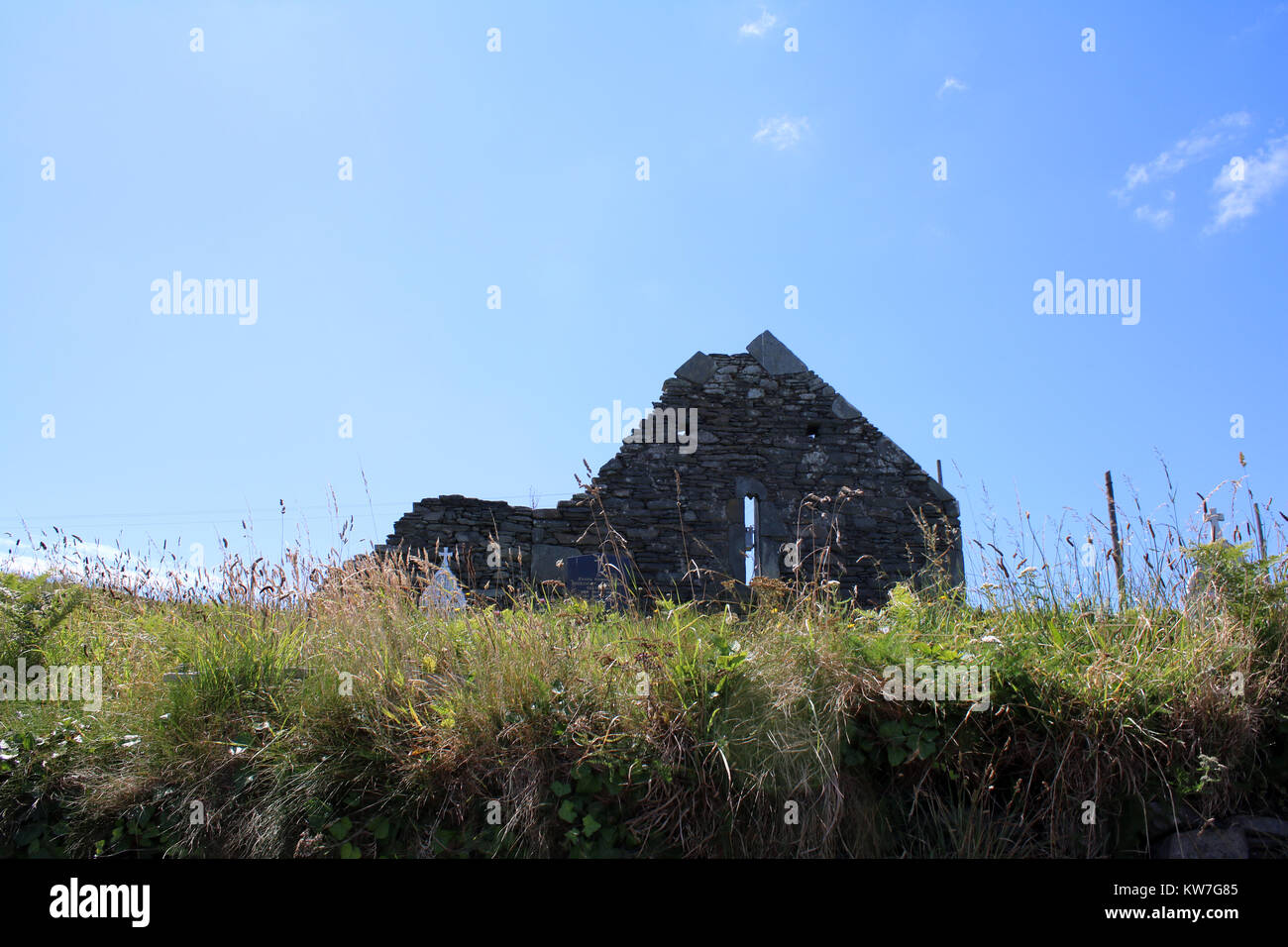 Ruin of an old stone church with religious monuments located in west ...
