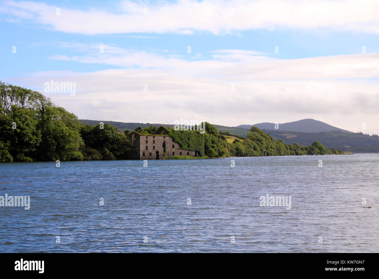 Old stone ruin at the edge of the water, Ireland Stock Photo - Alamy