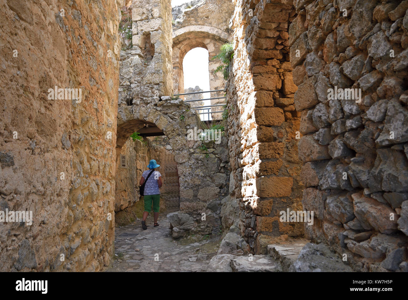 Women walking through a portal in a ruin,picture from the North of ...