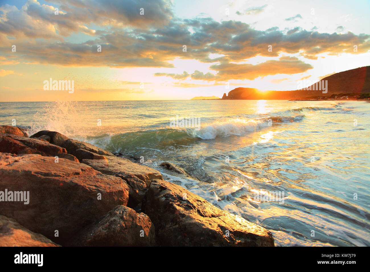 Sunset sea and beach, Italy Stock Photo - Alamy