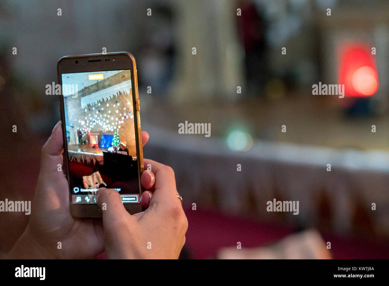 shoots on the smartphone performance on the stage Stock Photo - Alamy