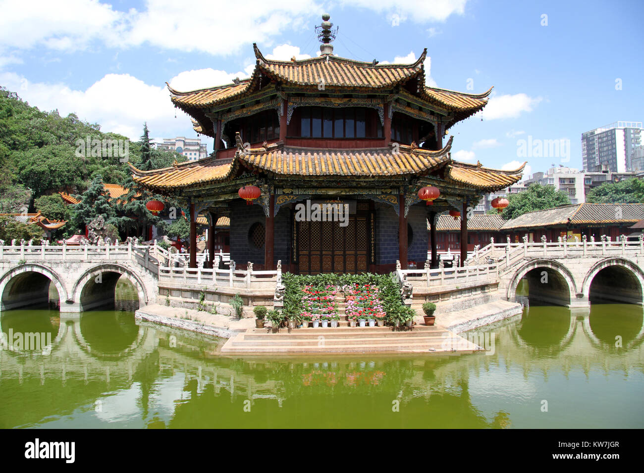 Old chinese pagoda and two bridges in buddhist temple in Kunming, China ...