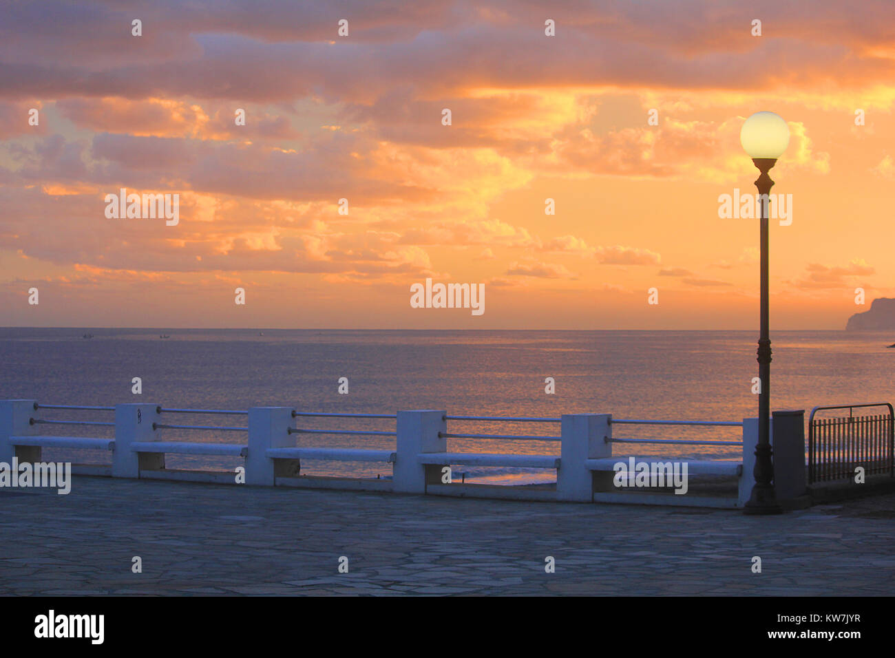 a sea view at sunset Stock Photo - Alamy