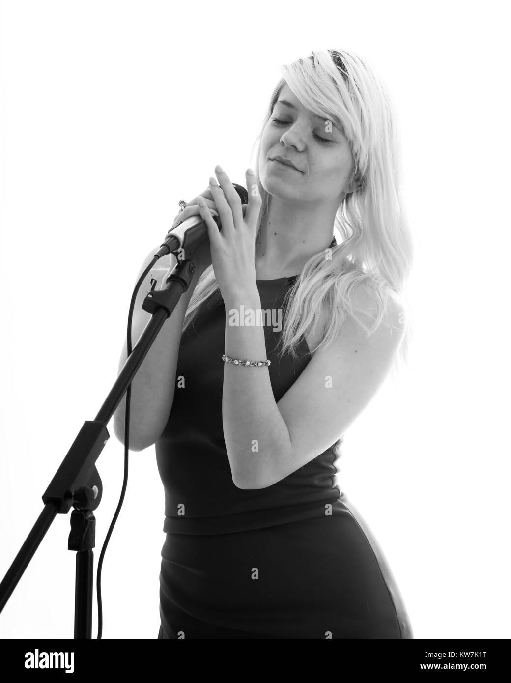 December 2017 - Young woman performer with her microphone Stock Photo ...