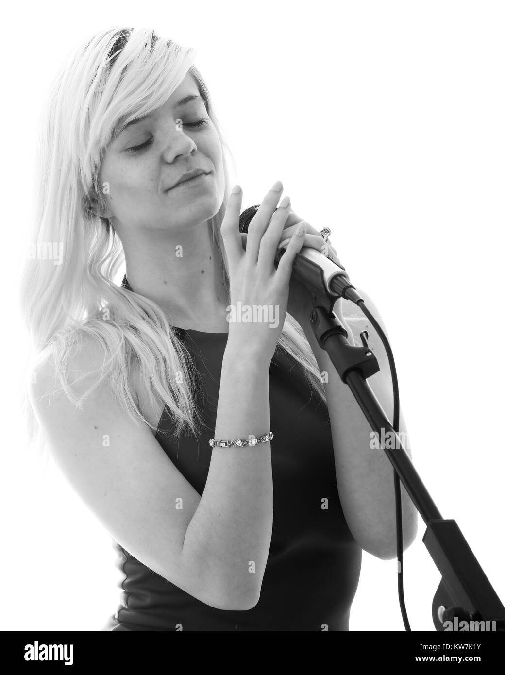 December 2017 - Young woman performer with her microphone Stock Photo ...