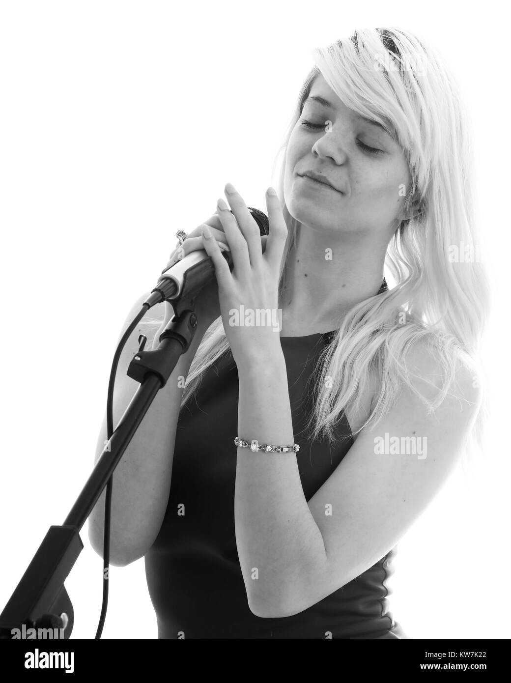 December 2017 - Young woman performer with her microphone Stock Photo ...