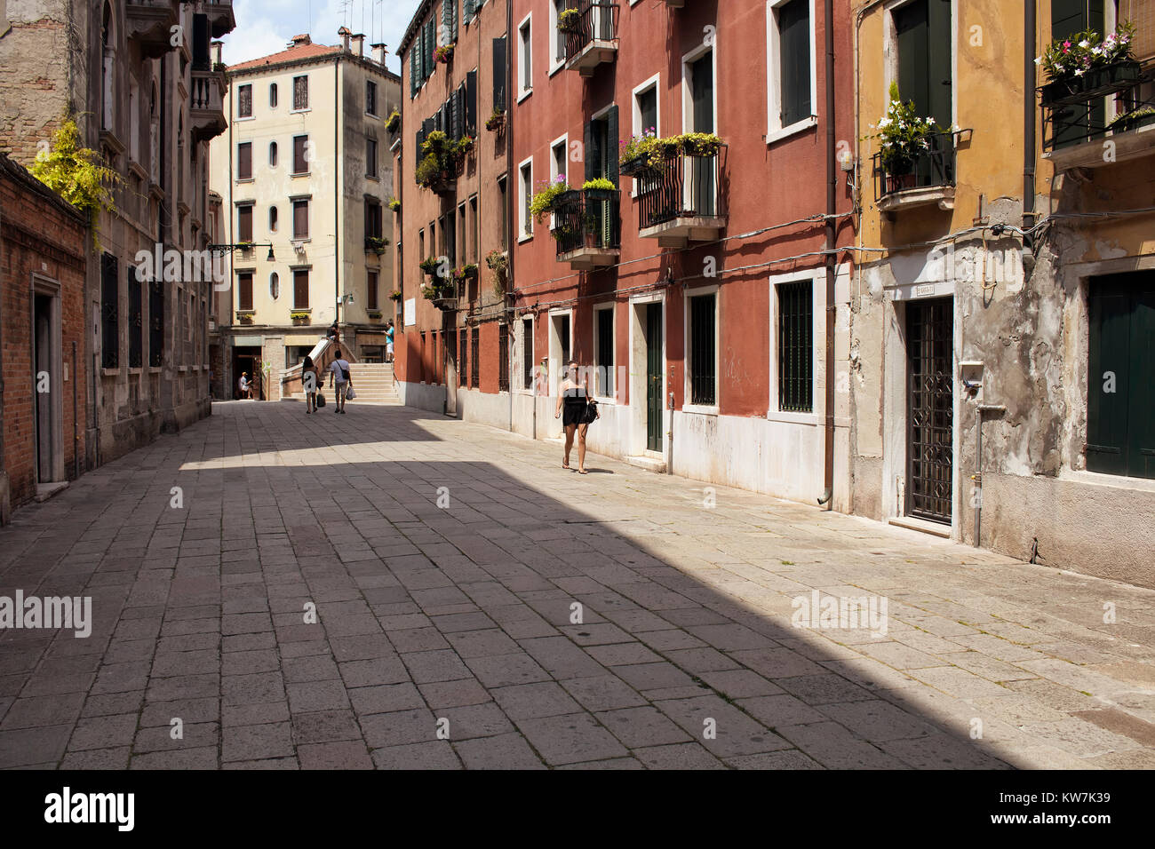People walk walk on a street in Venice / Italy Stock Photo - Alamy