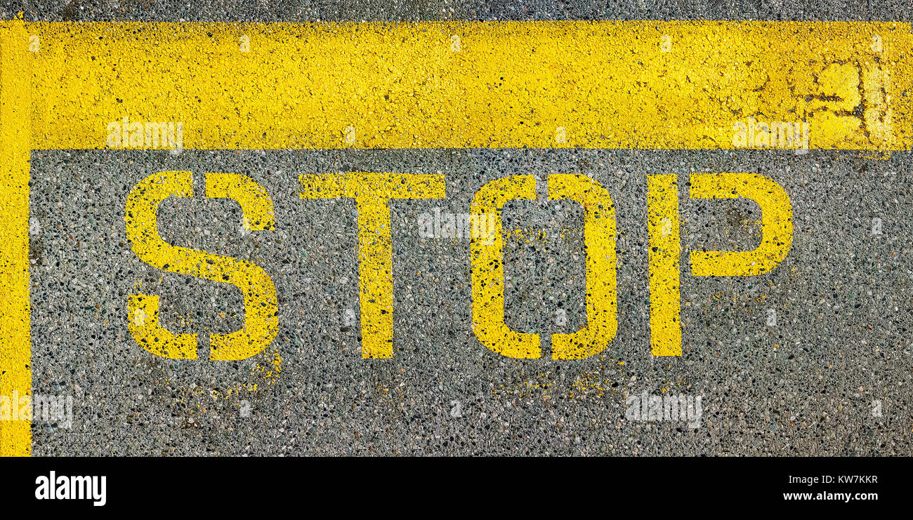 Stop line painted on asphalt Stock Photo - Alamy