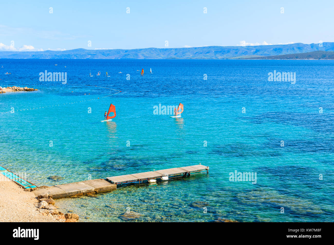 View of pier on beautiful beach in Bol town, Brac island, Croatia Stock ...