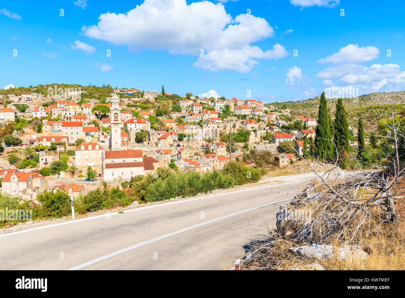 Road to Lozisca village with colorful houses and church, Brac island ...