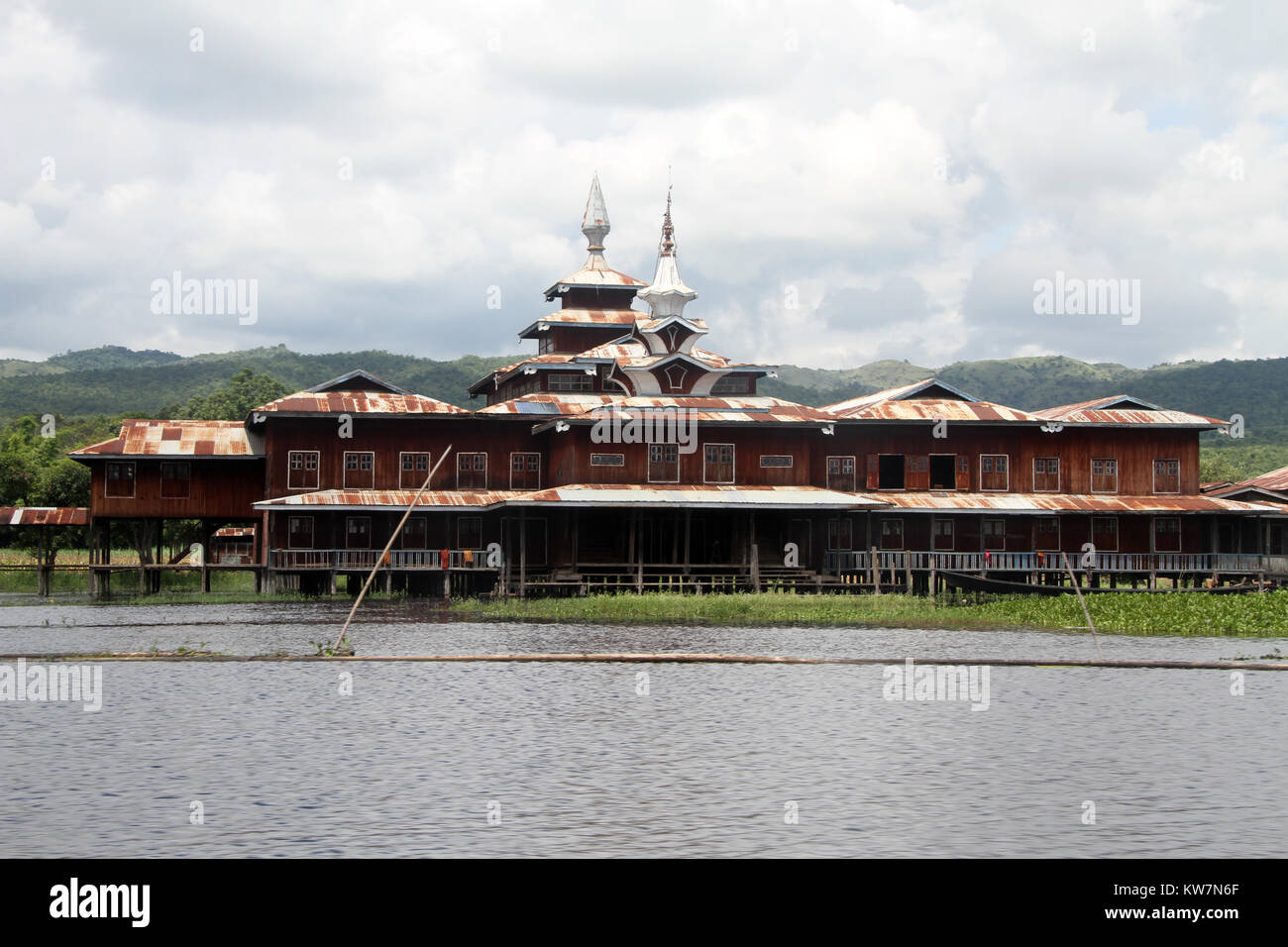 Wooden burmese buddhist monastery on the Inle lake, Myanmar Stock Photo ...