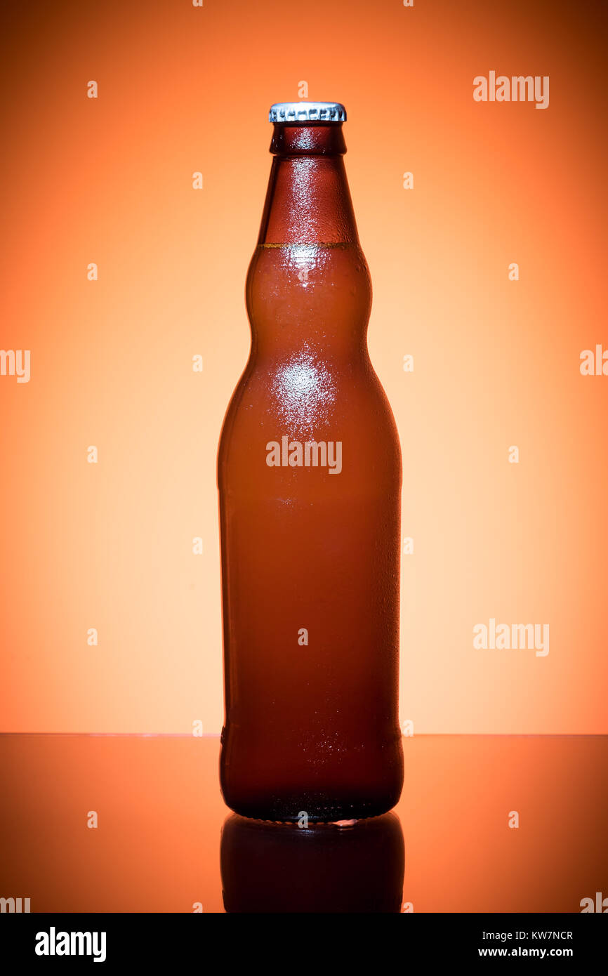 Bottle of beer empty full condensate cold refreshing Still life on gold ...