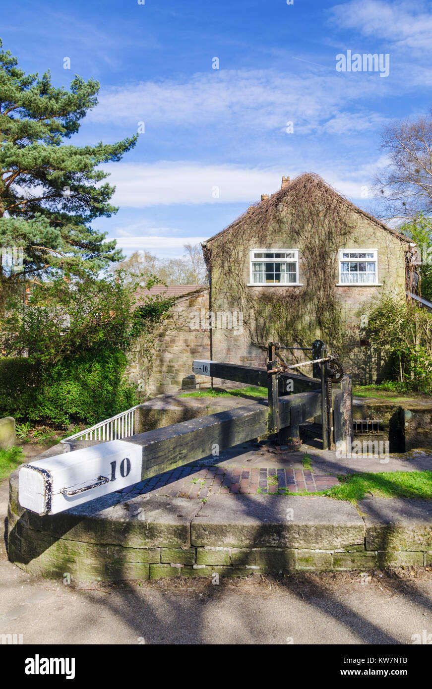 An old lockhouse beside a lock on the Peak Forest Canal, Marple ...