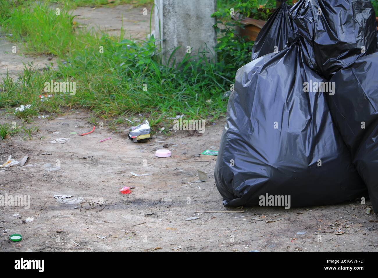 Pile black garbage bag roadside hi-res stock photography and images - Alamy